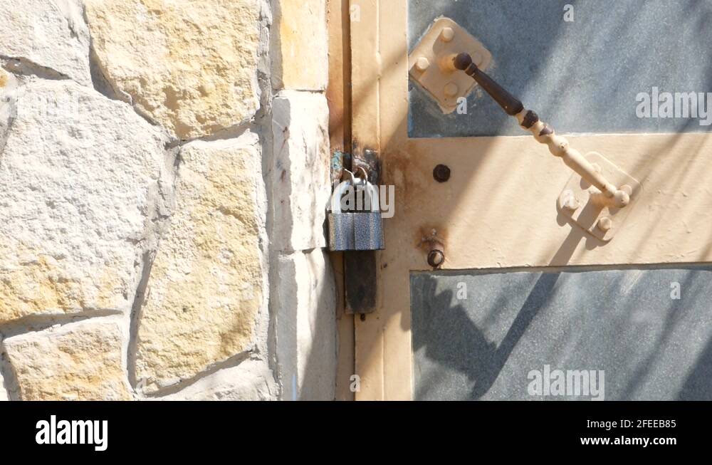 Old prison. Barbed wire. White wall with metal barbed fence Stock Video ...