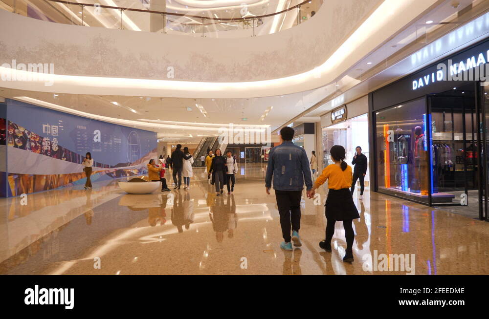 qingdao city center famous mall crowded main atrium walking panorama 4k ...