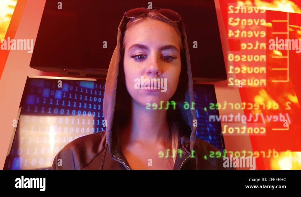 Female Hacker Looking At Screen While Working On System Code Computer