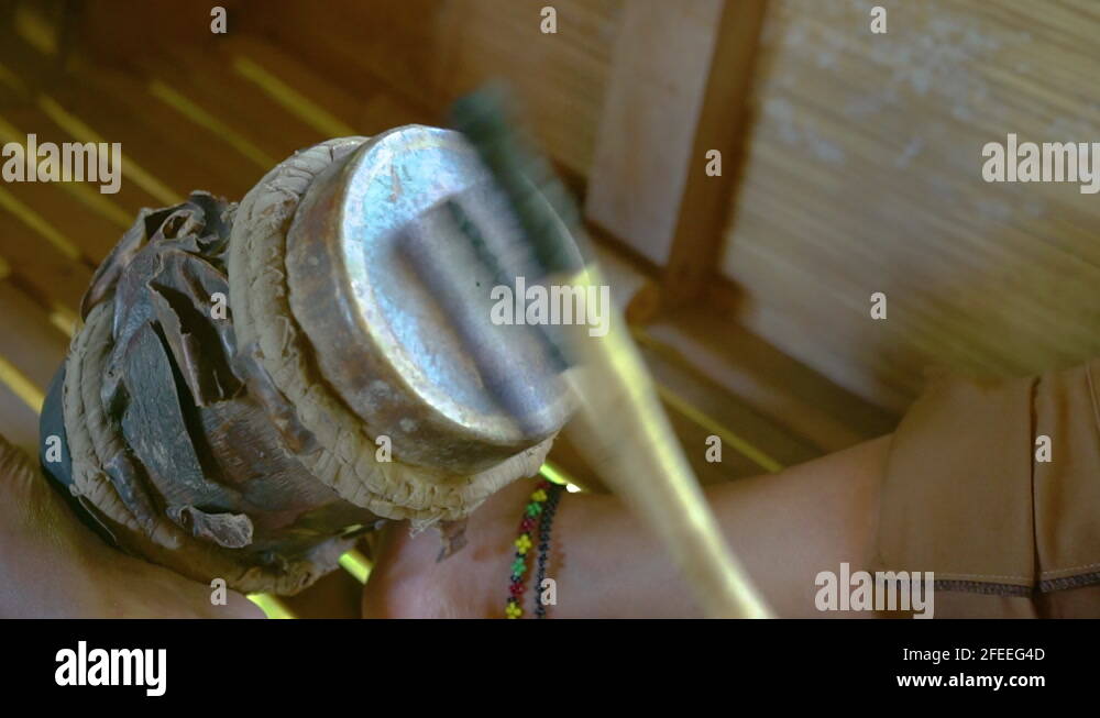 Playing a Native Filipino Percussion Instrument T'Nonggong from T'Boli ...