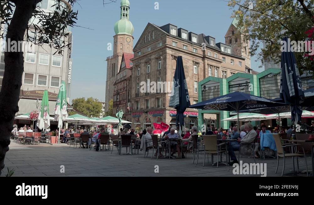 Normal life at old market square Dortmund Germany tilt up Stock Video ...