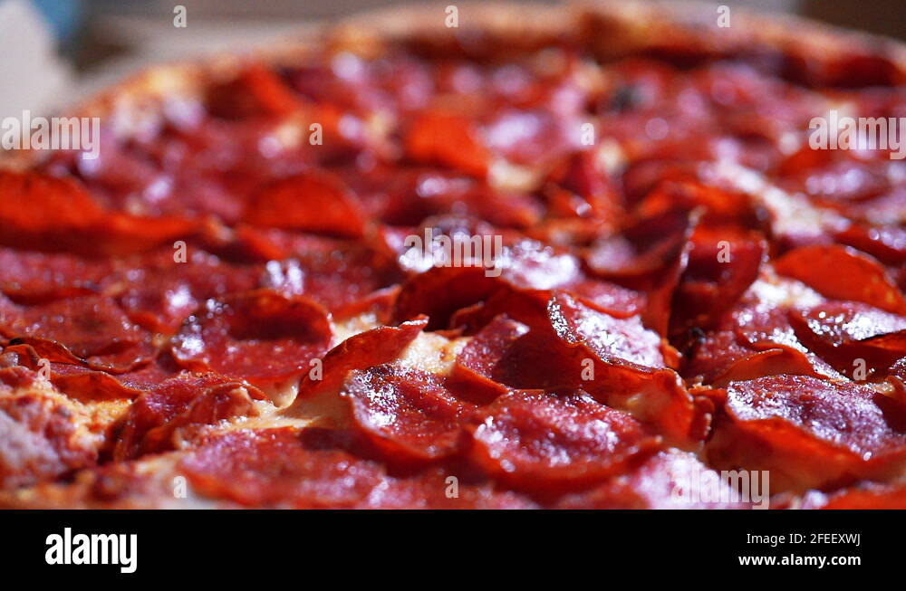 Pepperoni pizza with meat stacked on the melted cheese and crust fresh ...