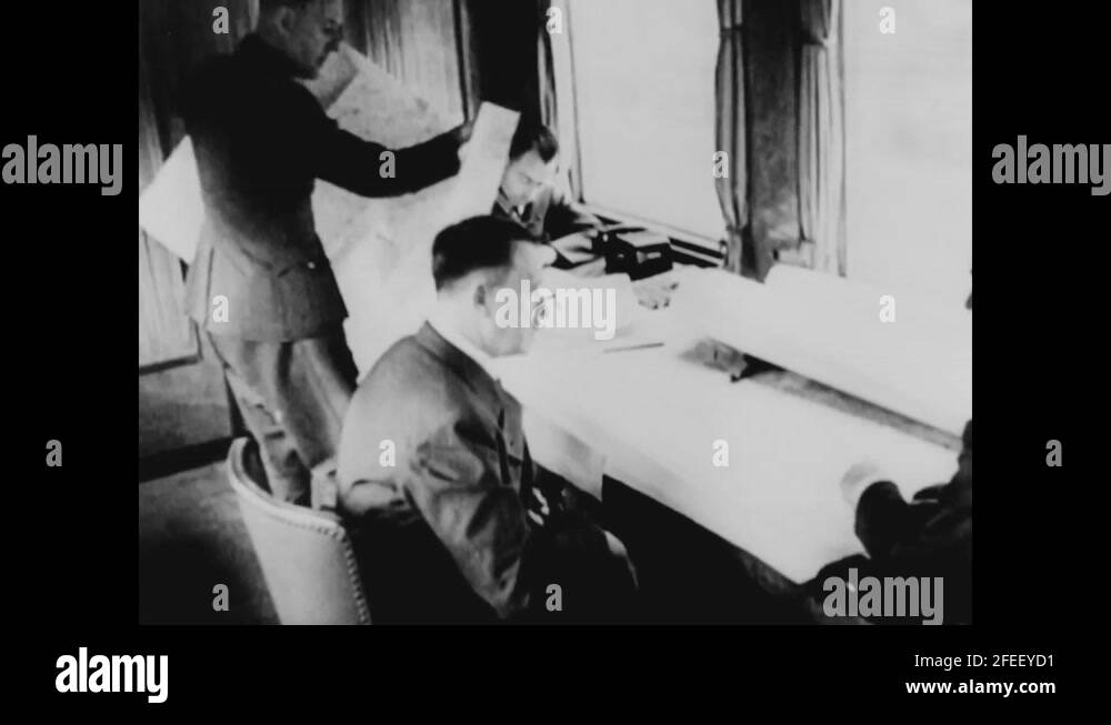 Adolf Hitler and Hermann Goering discussing tactics during train ride ...