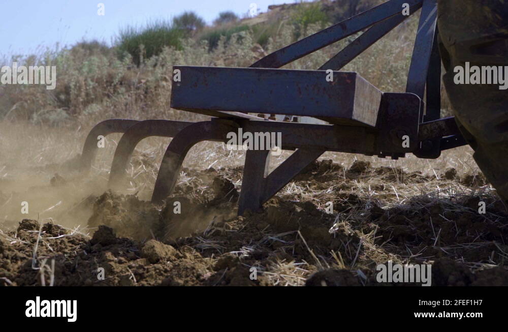 Plowing the land with tractor, traditional cultivation Stock Video ...