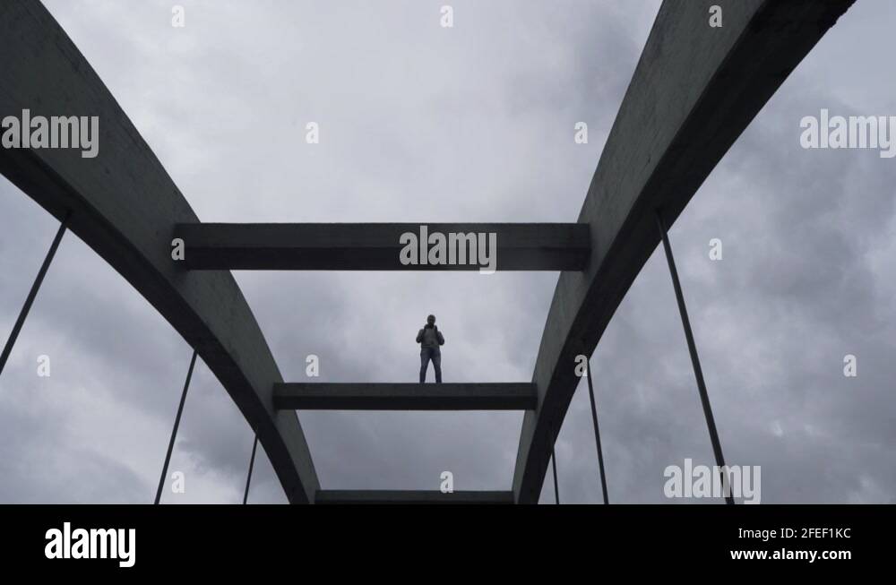 Man standing on top of a bridge Stock Videos & Footage - HD and 4K ...