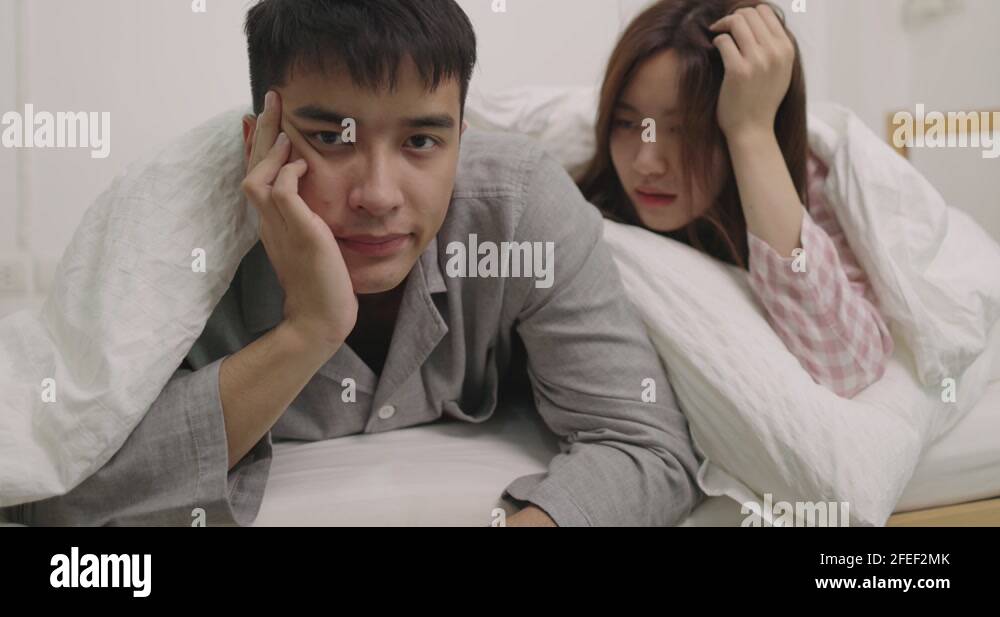 Couple bored bed Stock Videos & Footage - HD and 4K Video Clips - Alamy