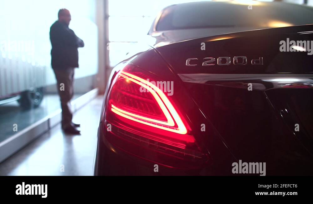 Rear light of the car in the garage. VIP transportation artists ...