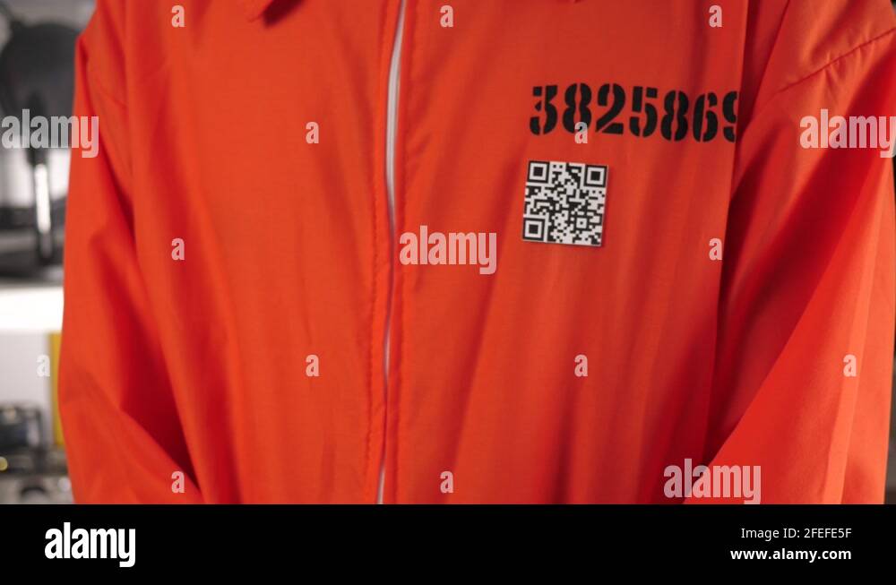 Jail Inmate Wearing a QR Code on his Prison Uniform for Identification ...