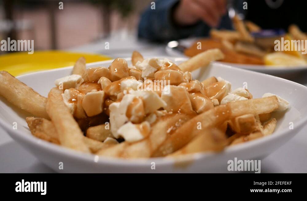Poutine dish Stock Videos & Footage - HD and 4K Video Clips - Alamy