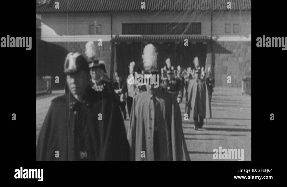 1940s: Japanese women in rows, bow. German officers, generals walk down ...