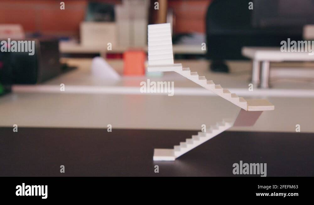 White Foam Model Staircase Sits upon Brown Deck in Architecture Firm ...