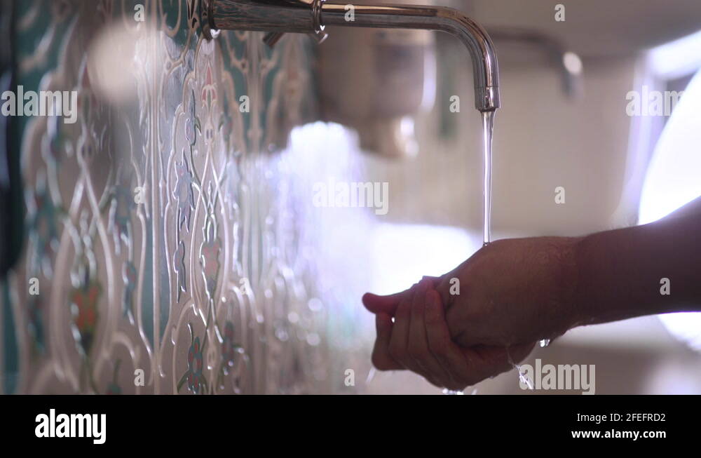 Muslim washing hands Stock Videos & Footage - HD and 4K Video Clips - Alamy