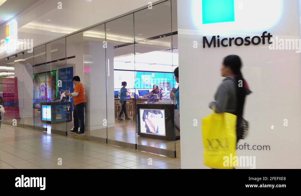 Microsoft store closing down at night inside Burnaby shopping mall with ...