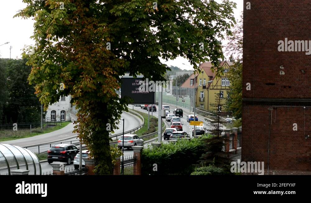Electric sign board over a busy road in Gdansk informs drivers about ...