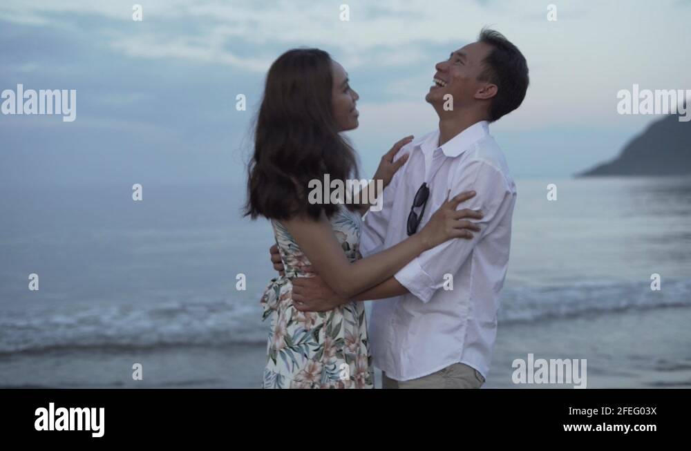 Sweet Filipino Couple Hugging Each Other And Laughing Together On A ...