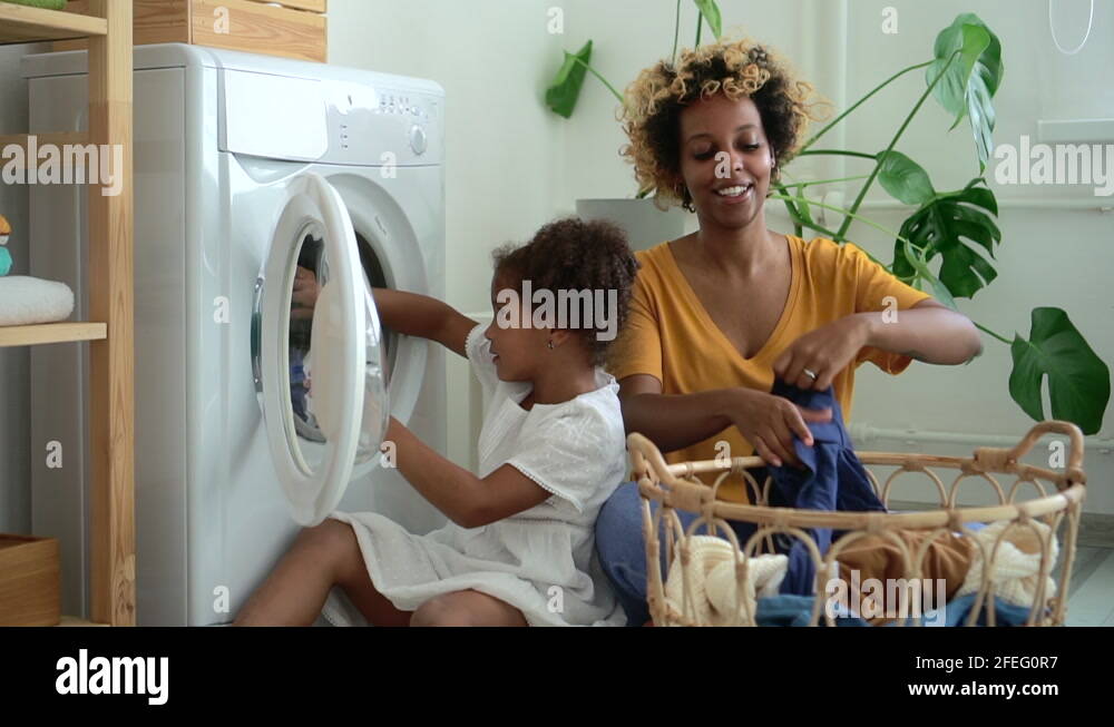 Child washing machine loading Stock Videos & Footage - HD and 4K Video ...