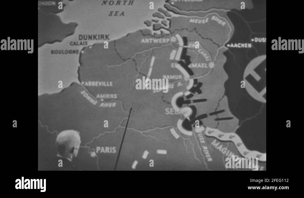 1940s: General talks while pointing to map of Europe, showing Nazi ...