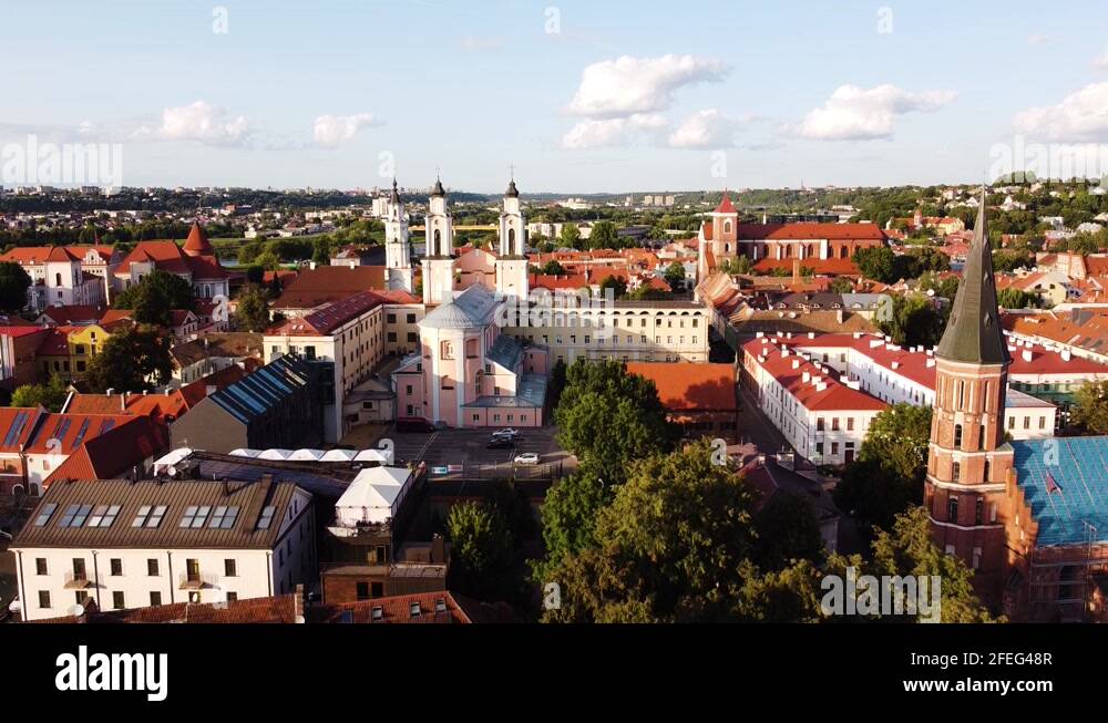 Kaunas city old town aerial drone shot while the drone is ascending and ...