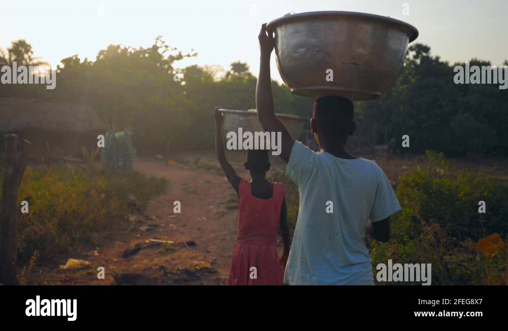 Woman carrying buckets Stock Videos & Footage - HD and 4K Video Clips ...