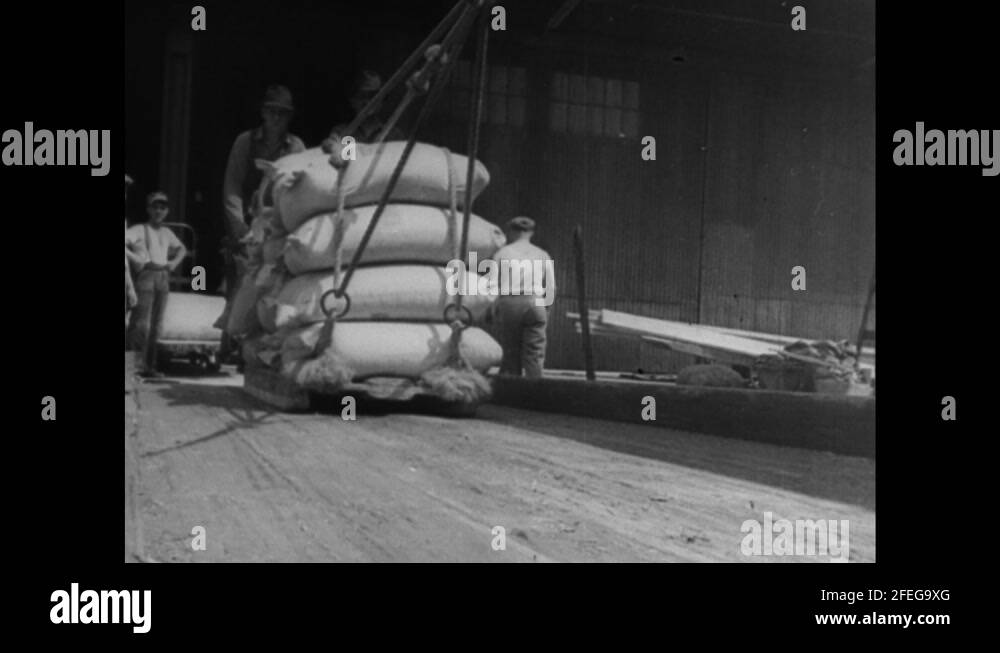 1940s: Ship, plane, tank, guns, port, men loading cargo. Lend-Lease Act ...