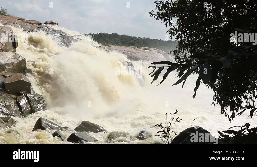Heavy flow of water dropping off of waterfalls of Usri River after rain ...