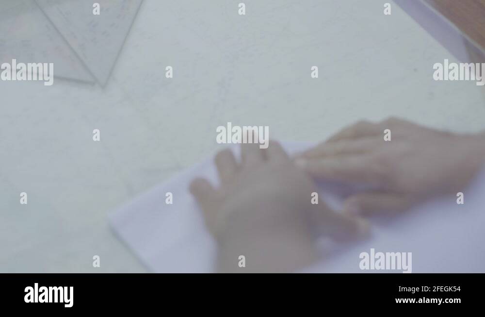 White paper folded Stock Videos & Footage - HD and 4K Video Clips - Alamy