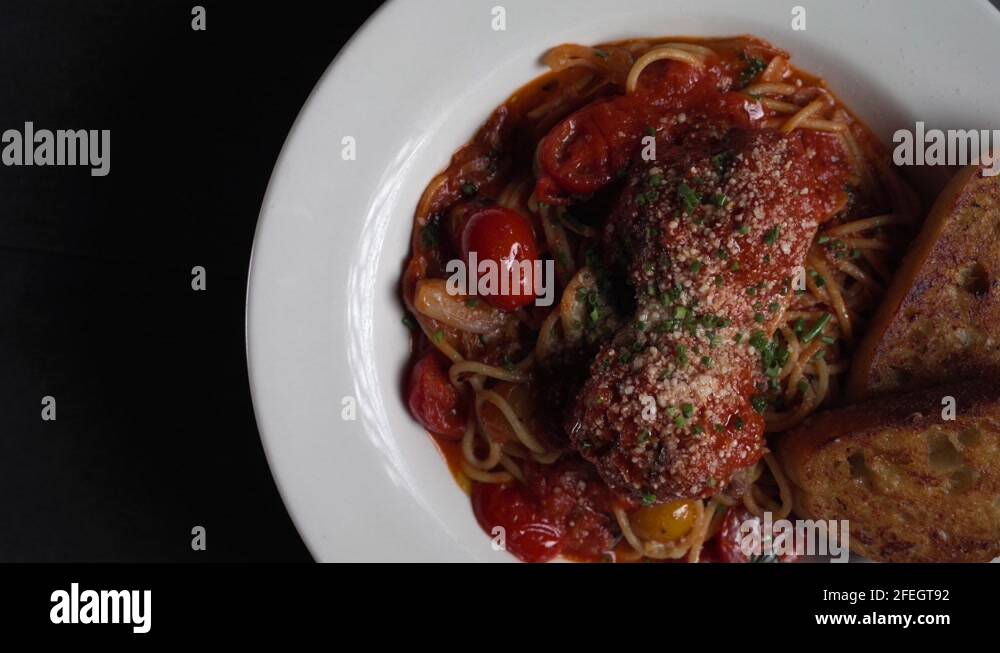Spaghetti and Meatballs spinning on black background 4k Stock Video ...