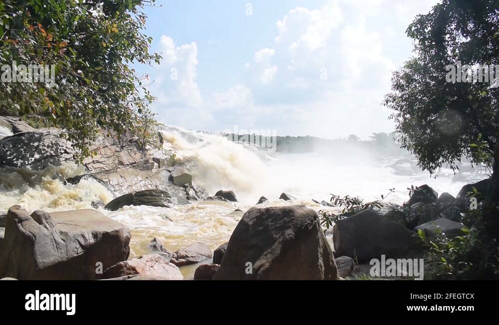 A heavy flow of water dropping off of waterfalls of Usri River at Usri ...