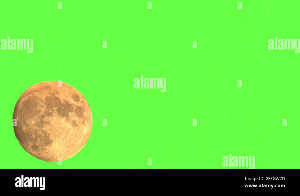 Large Illuminated Full Moon Moving Across A Green Screen Background ...