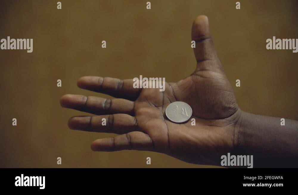 two indian rupees coin in hand feast opeing hand reviling coin Stock ...