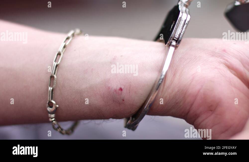 Unlock handcuffs Stock Videos & Footage - HD and 4K Video Clips - Alamy