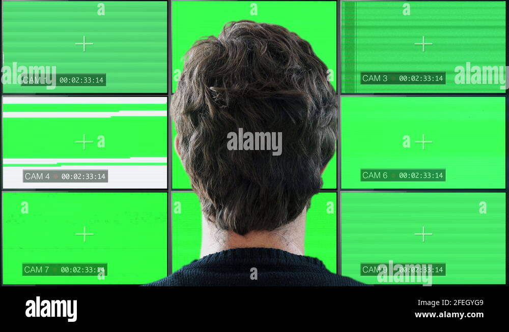 Watching Multiscreen Monitors Green Screen TV static Stock Video ...