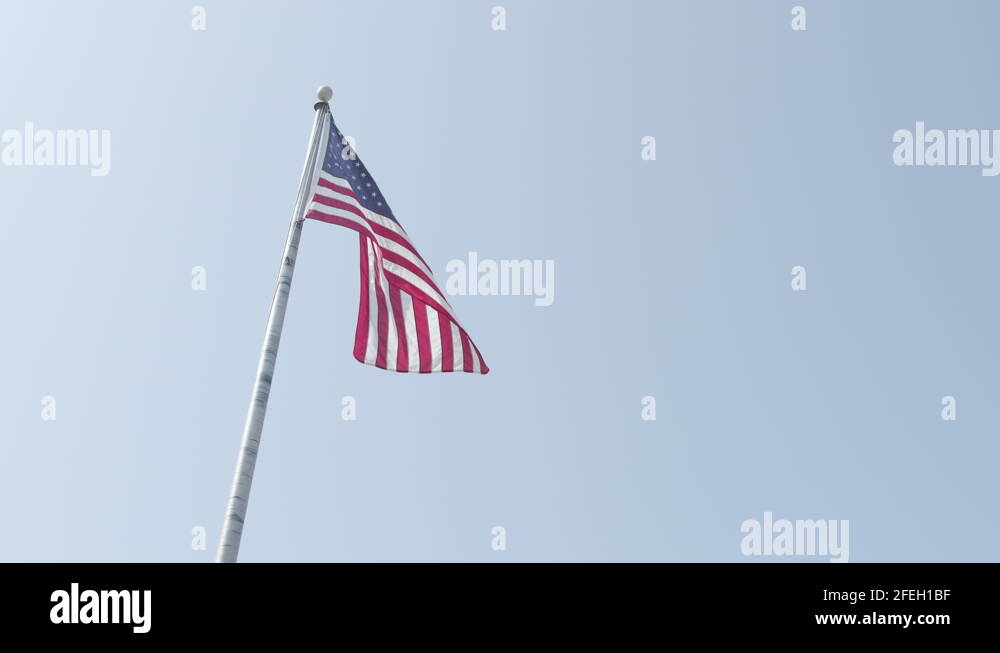 Waving flag pole Stock Videos & Footage - HD and 4K Video Clips - Alamy