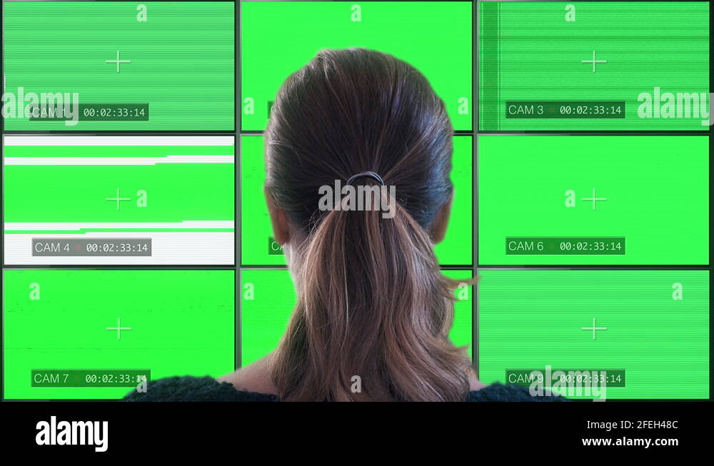 Watching Multiscreen Monitors Green Screen TV static Stock Video ...