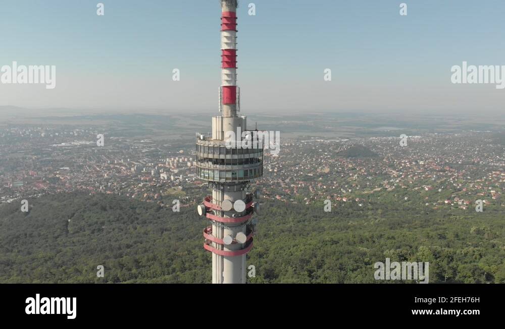 Drone reveal shot of the Pécs TV Tower. Pécs is the fifth largest city ...