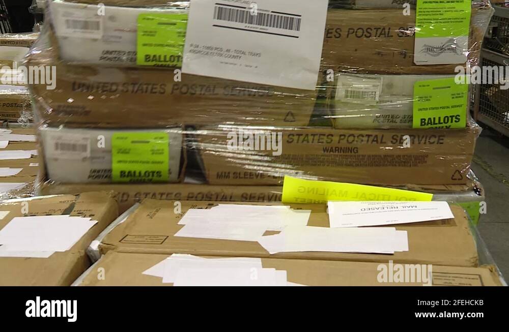 BOXES OF BALLOTS DELIVERED FROM POSTAL SERVICE USPS Stock Video Footage ...
