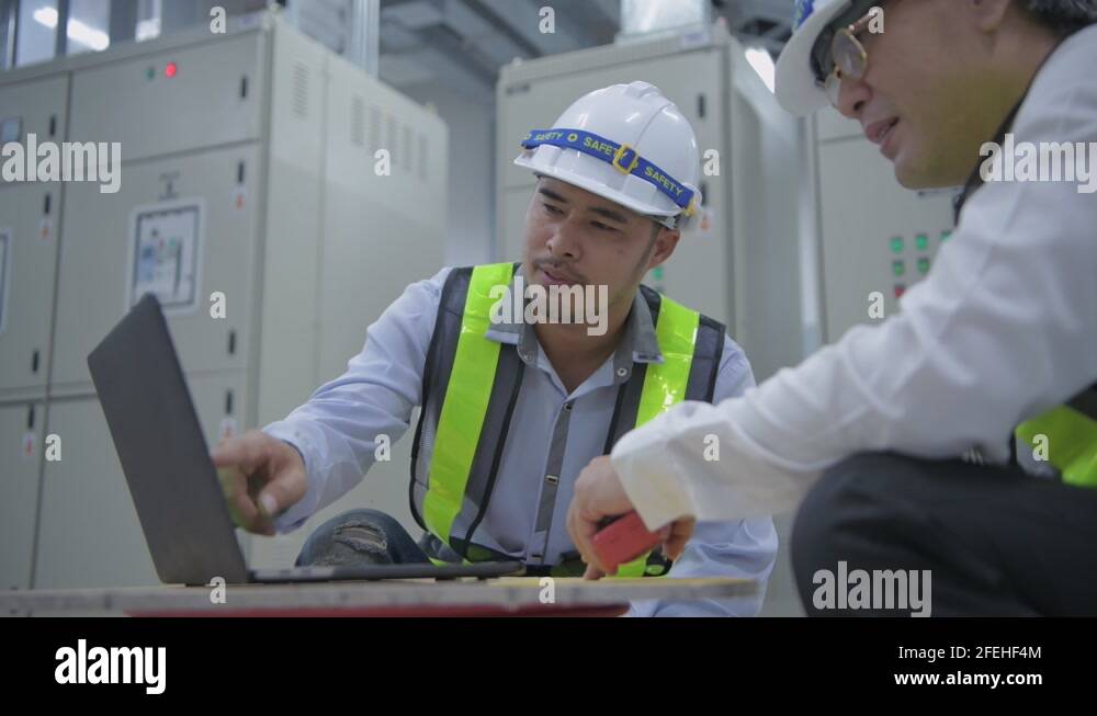 Engineer concept. The employee is checking the generator. 4k Resolution ...