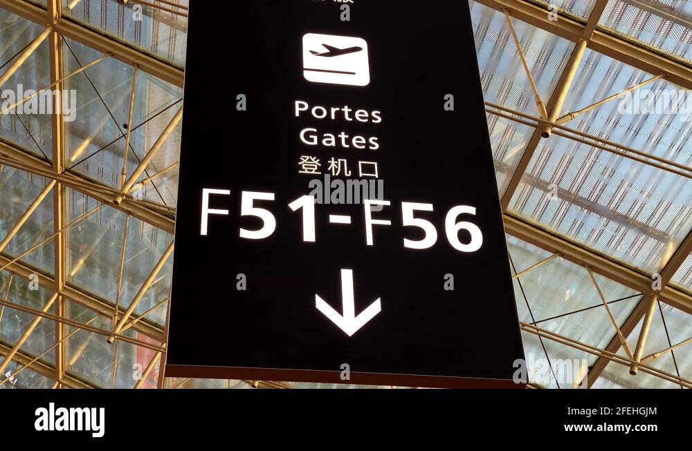 Sign of an airport terminal showing the gates Stock Video Footage - Alamy