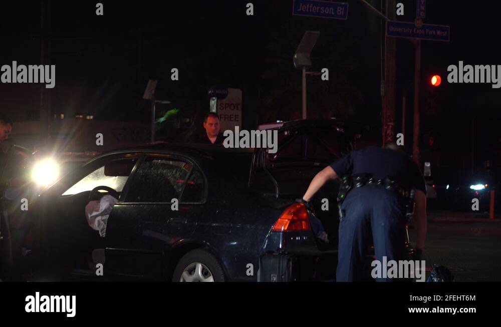 lapd searching suspects vehicle at crime scene Stock Video Footage - Alamy
