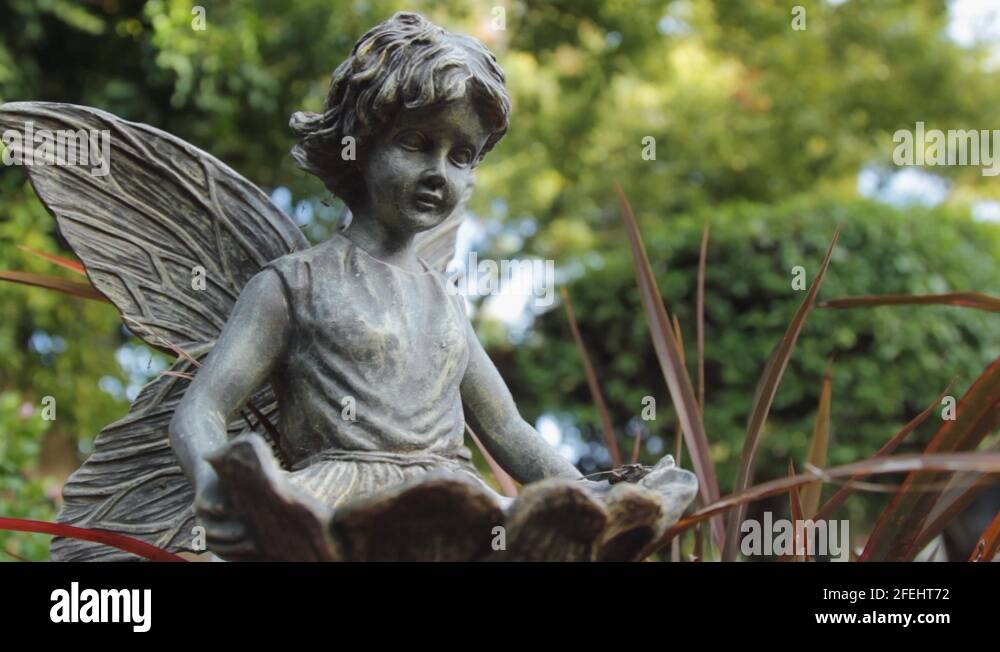Garden angel Stock Videos & Footage - HD and 4K Video Clips - Alamy