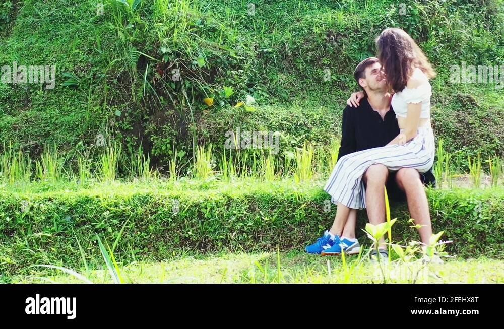 Rotating Slow Motion Of A Lovely Caucasian Girl Sitting On Her Partner
