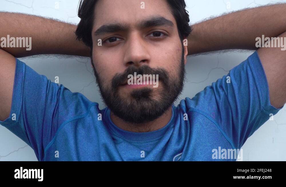 Portrait of man with hands behind head Stock Videos & Footage - HD and ...