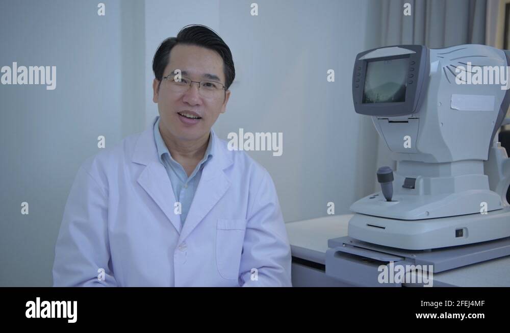 Optical shop concept. Asian doctors are interviewing about eye ...