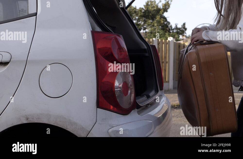 Woman lifting car boot Stock Videos & Footage - HD and 4K Video Clips ...