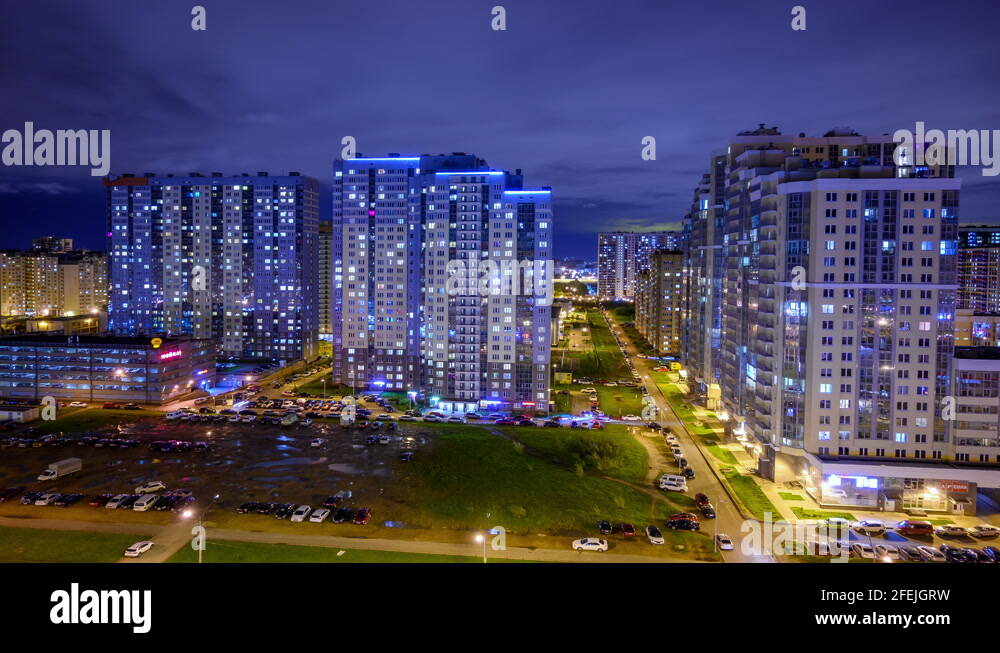 night window timelapse. architecture of the night city, urbanistic view ...