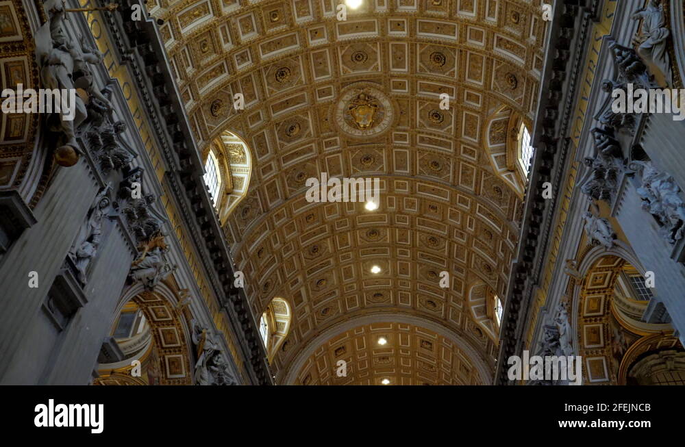 The gilded ceiling of St.Peter‘s Basilica,which is the center of ...