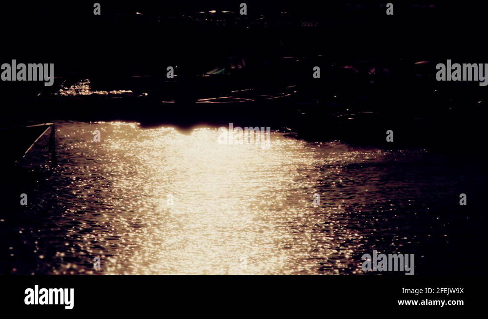 An intense emotional twilight scene at a small Italian harbor, with ...