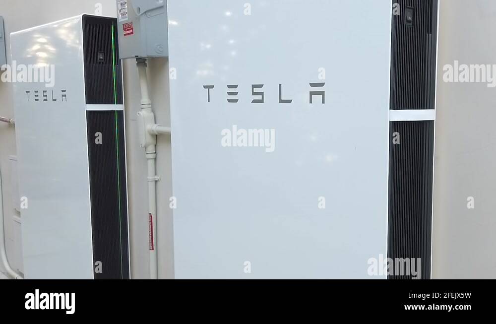 Tesla Powerwall, in home for solar panels, energy storage, pan down ...