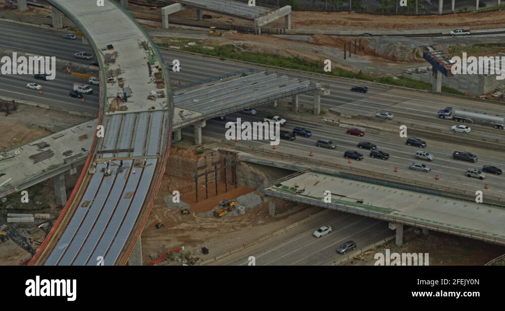 Atlanta Georgia Aerial v679 birdsye shot of traffic on freeway under ...