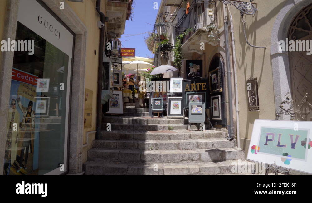 Fancy alley filled with art objects in small Italian town Stock Video ...